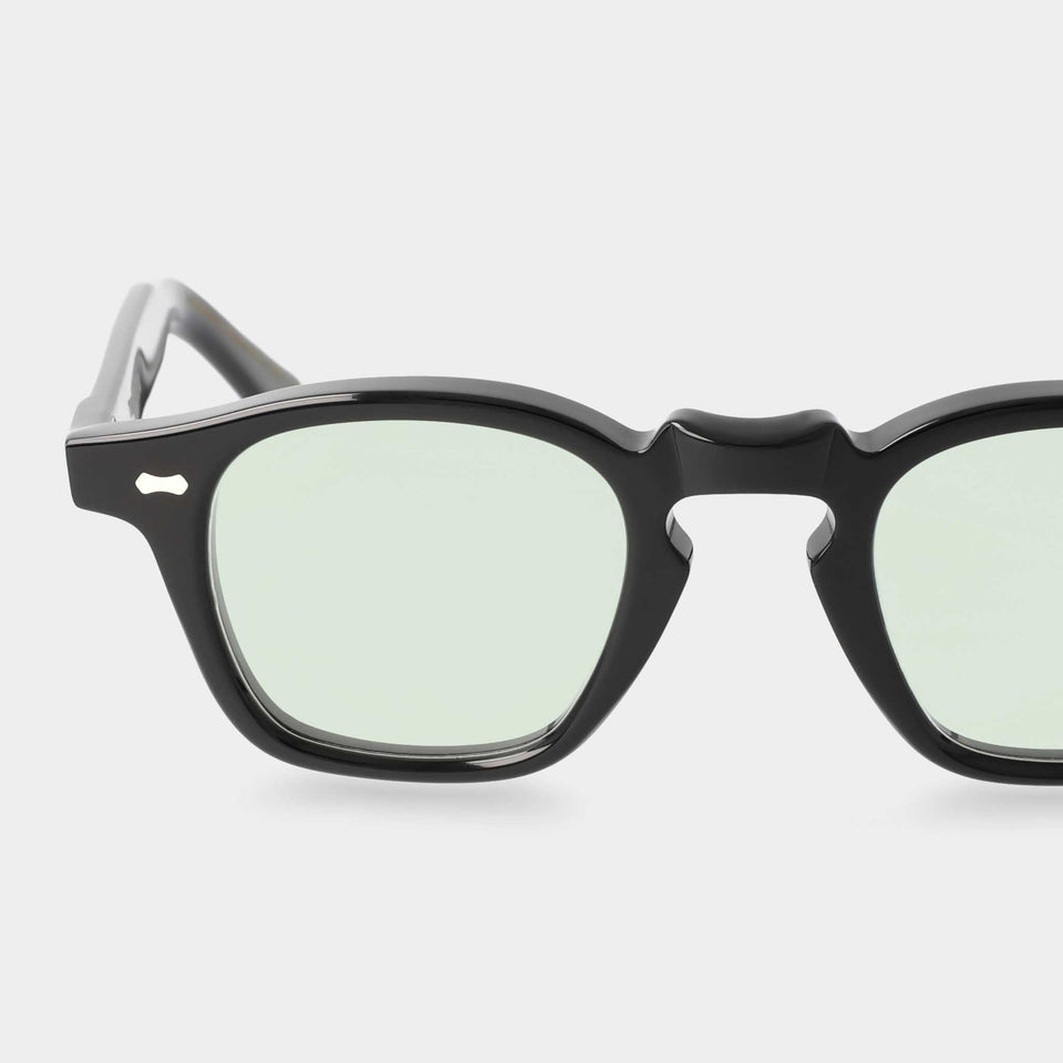 Black sunglasses with light green lenses: Cord | TBD Eyewear