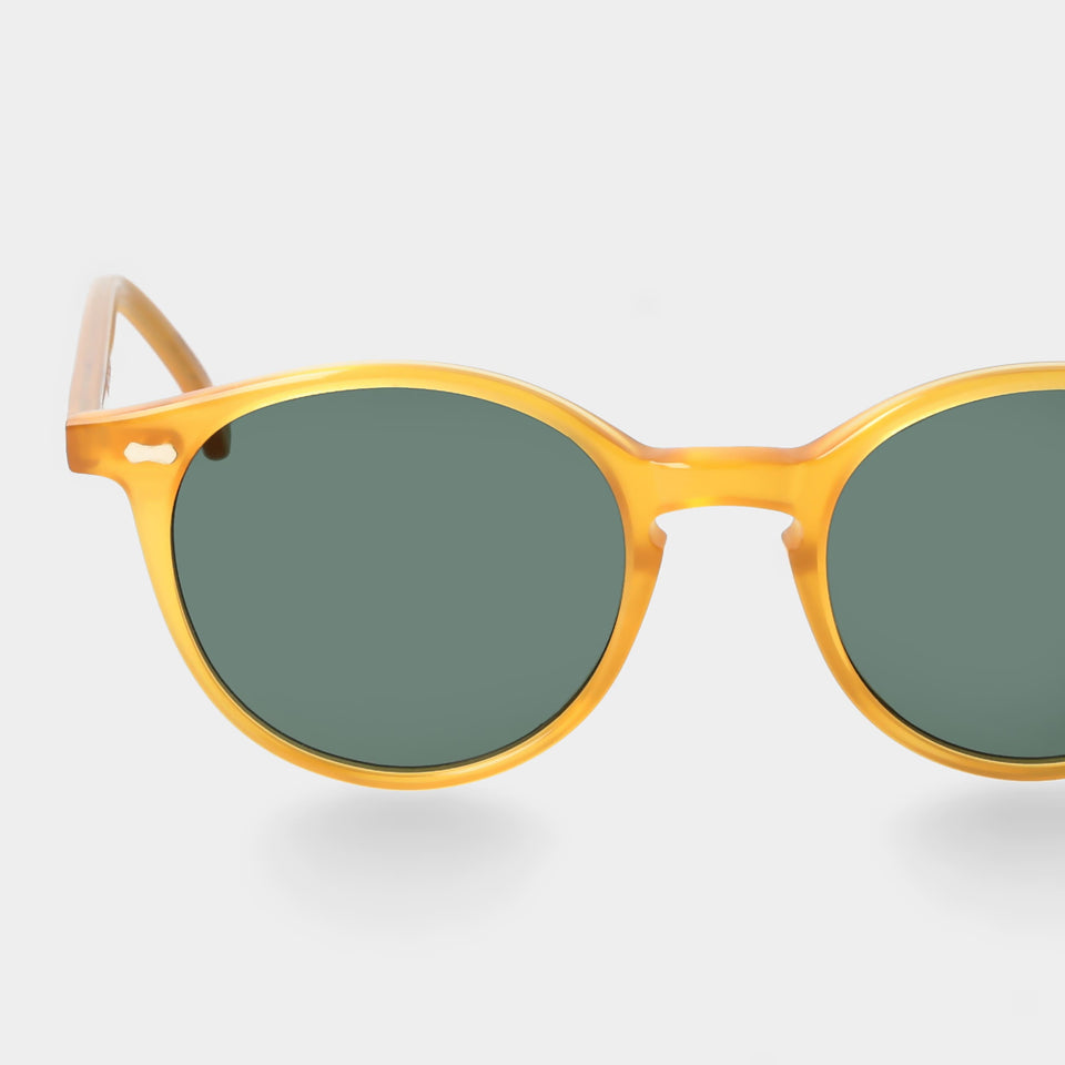 Yellow sunglasses with green lenses: Cran | TBD Eyewear