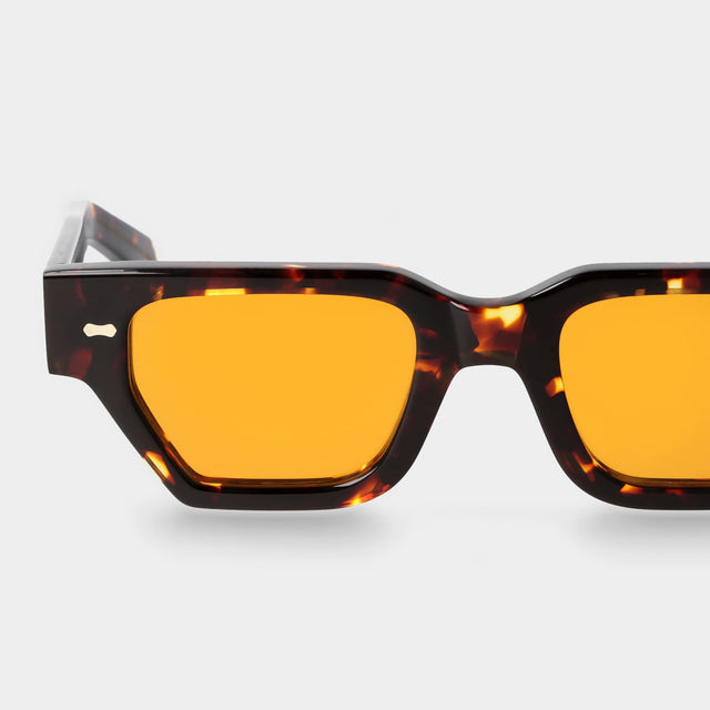 Black ssunglasses with orange lenses: Raso | TBD Eyewear