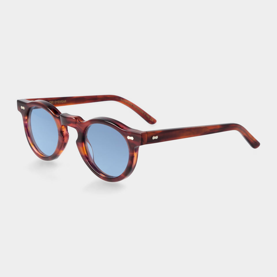 Brown sustainable sunglasses and blue lenses: Welt | TBD Eyewear