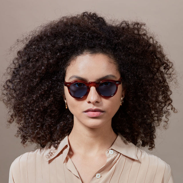 Brown sustainable sunglasses and blue lenses: Welt | TBD Eyewear