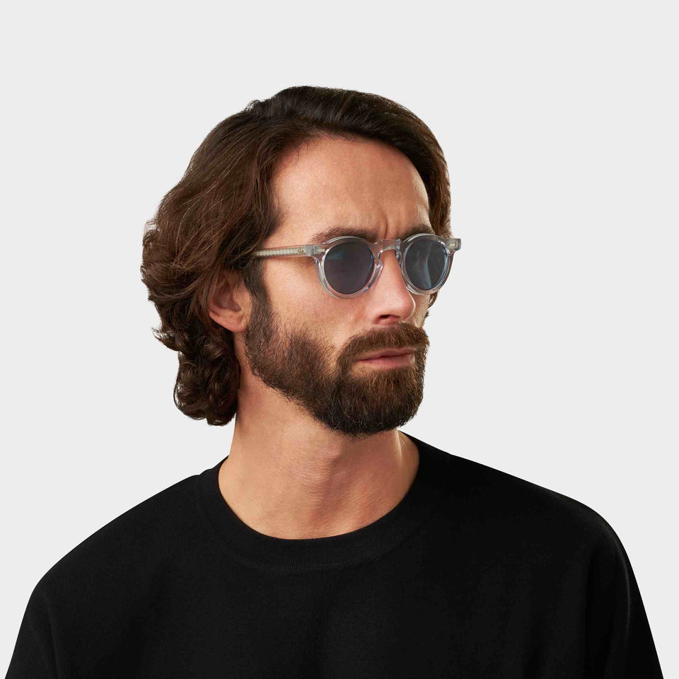 Transparent sunglasses with blue lenses: Welt| TBD Eyewear